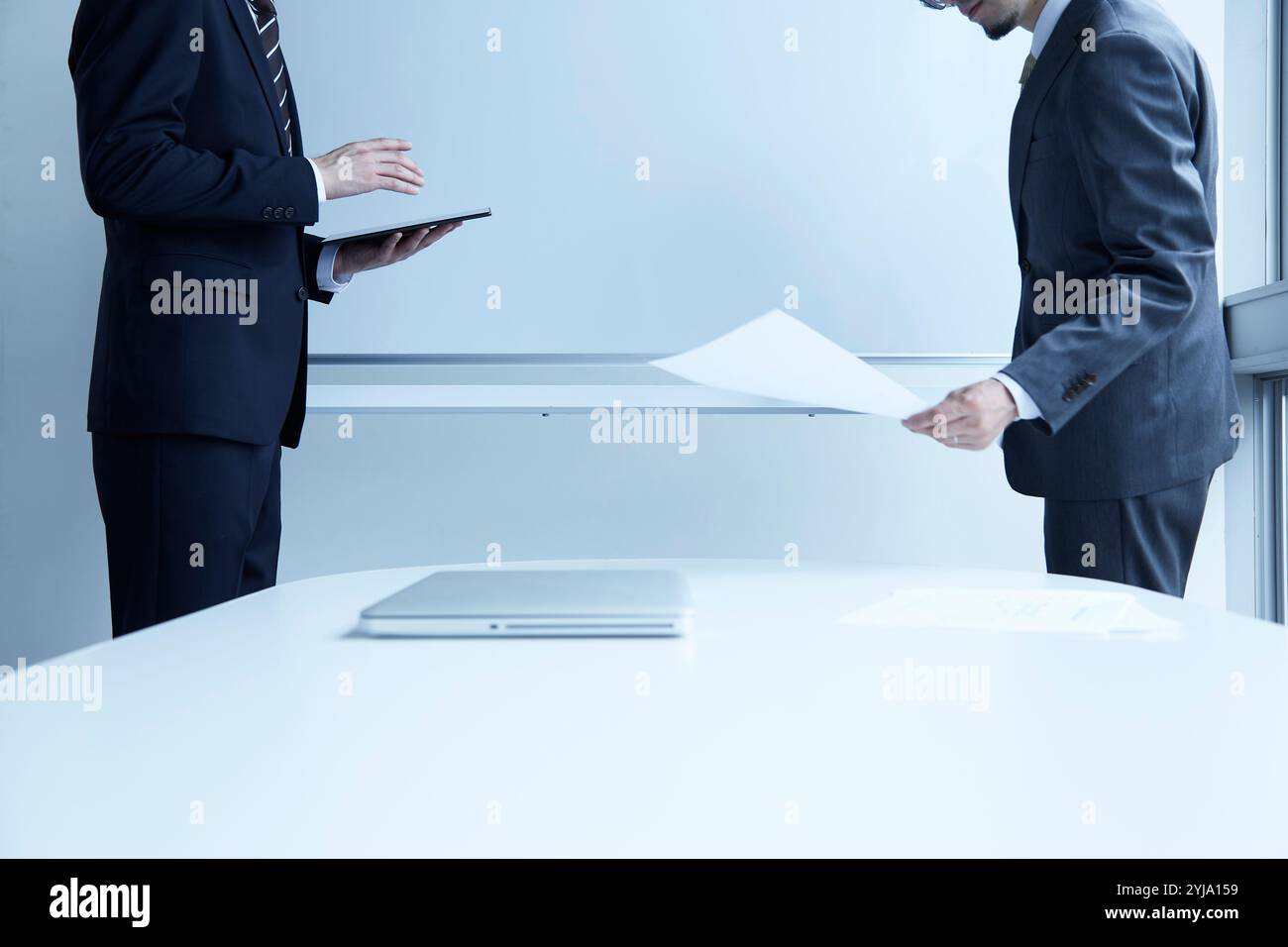 Two men facing hi-res stock photography and images - Alamy