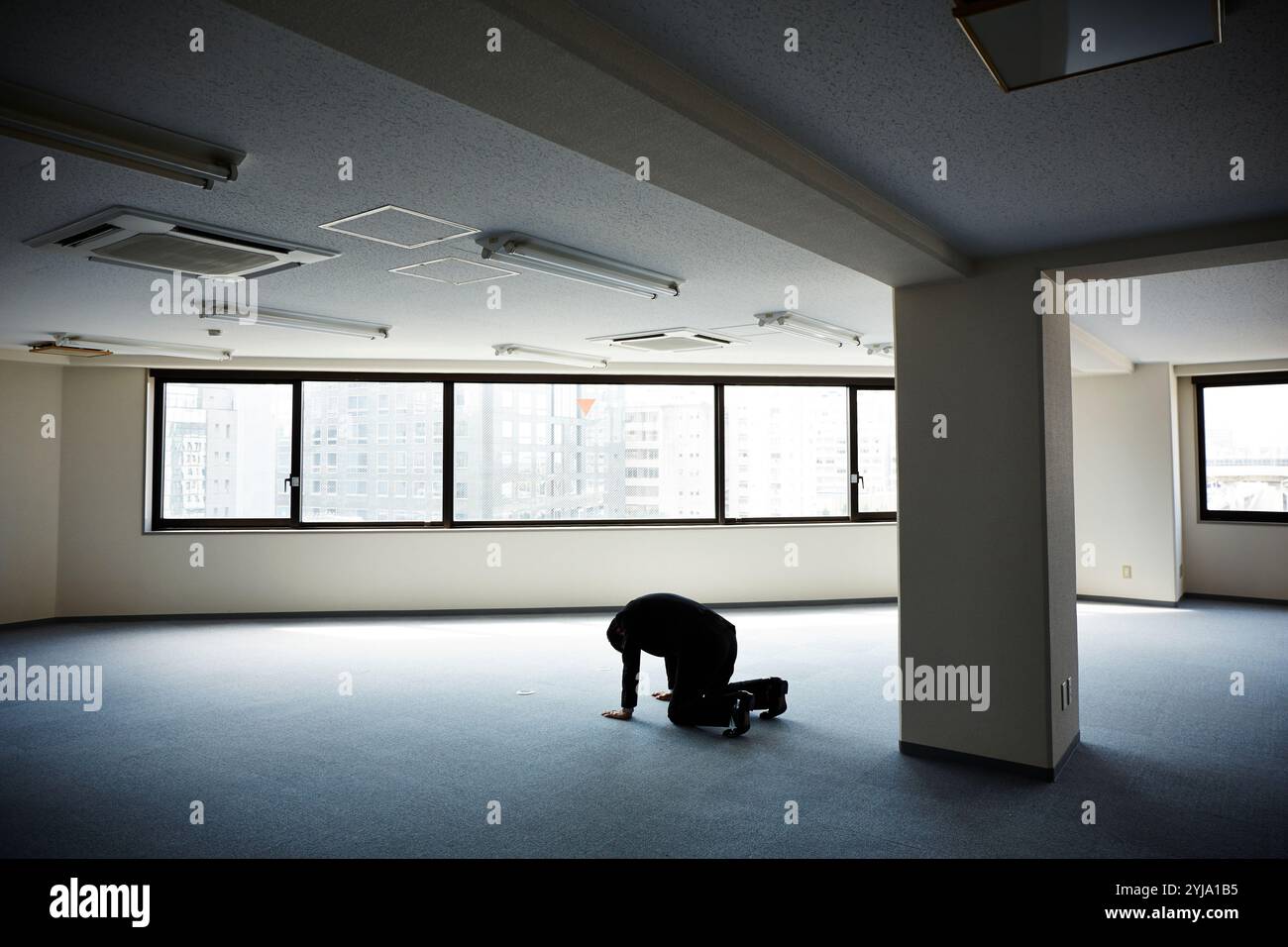 Man in suit on all fours hi-res stock photography and images - Alamy