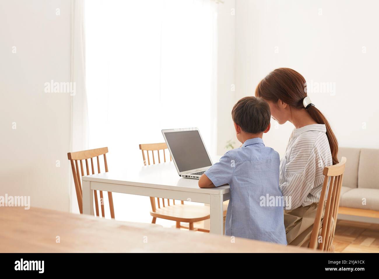 Boy working with computer hi-res stock photography and images - Alamy