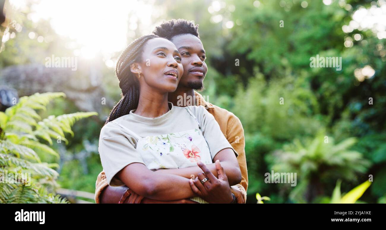 Nature, hug and black couple at park with relax, view and holiday in ...