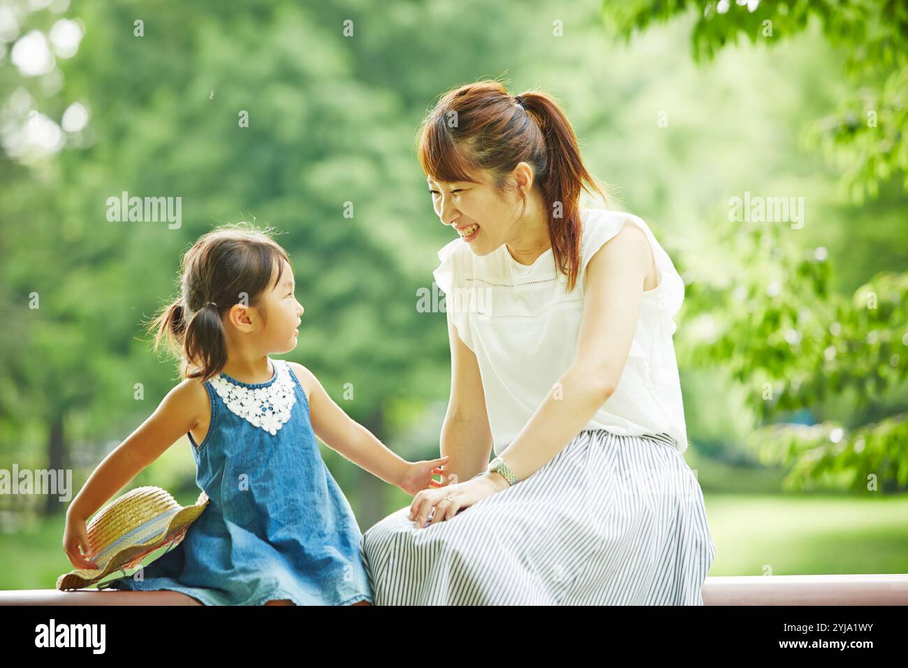 Mother daughter park bench hi-res stock photography and images - Alamy