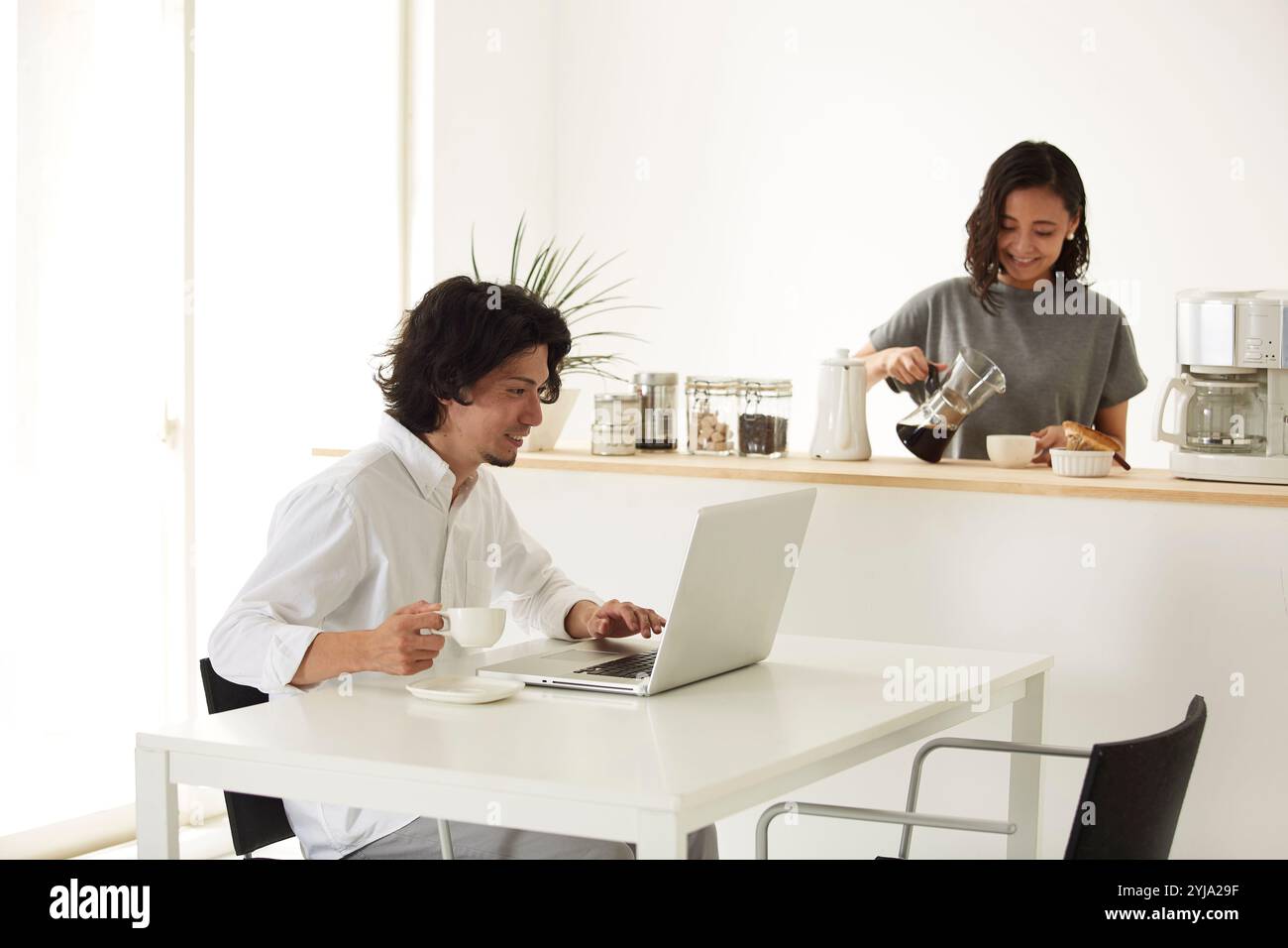Woman modern coffee machine hi-res stock photography and images - Alamy