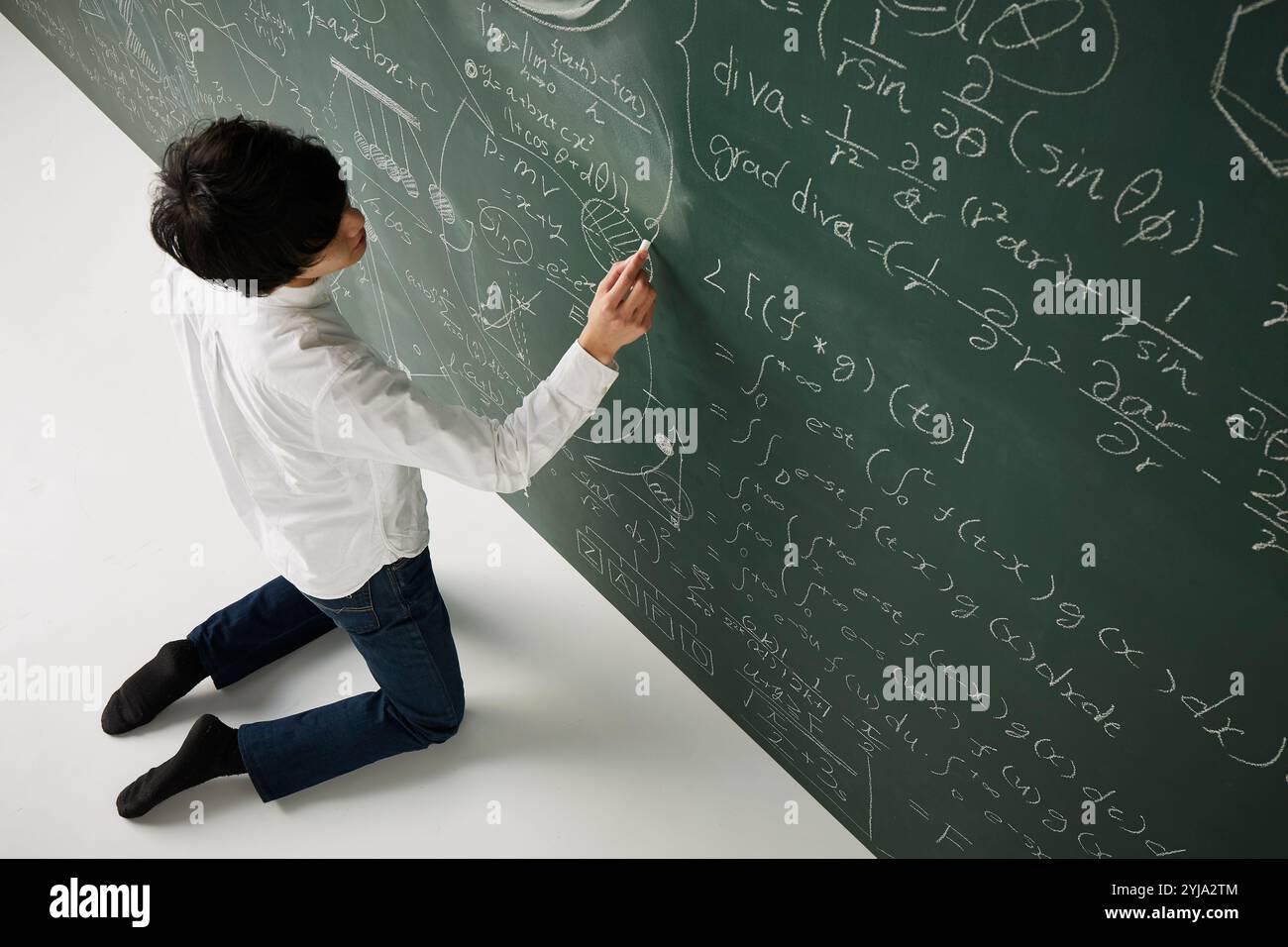 Chalkboards all over the wall filled with mathematical formulae Stock ...