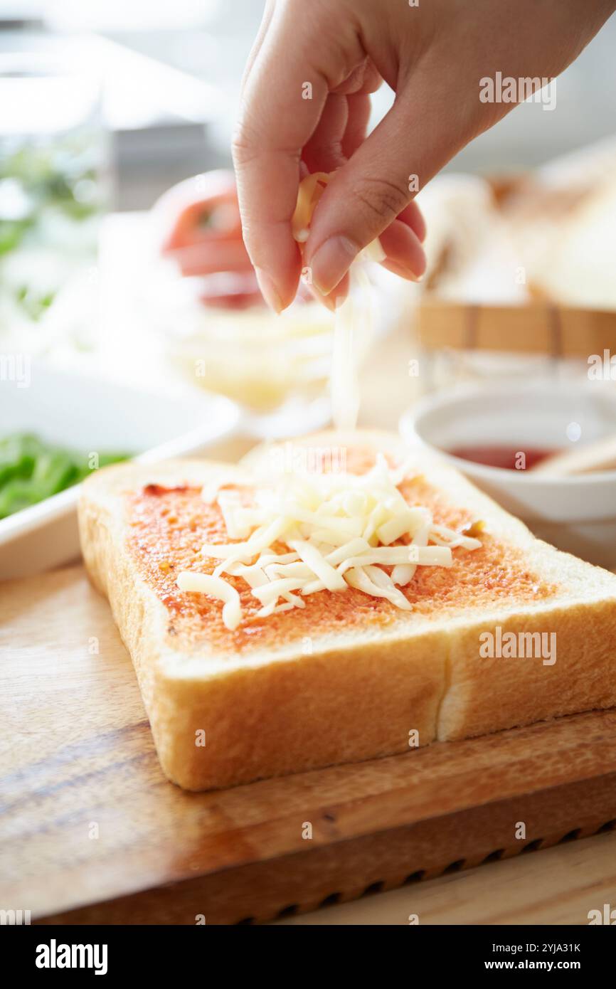Putting cheese hi-res stock photography and images - Alamy