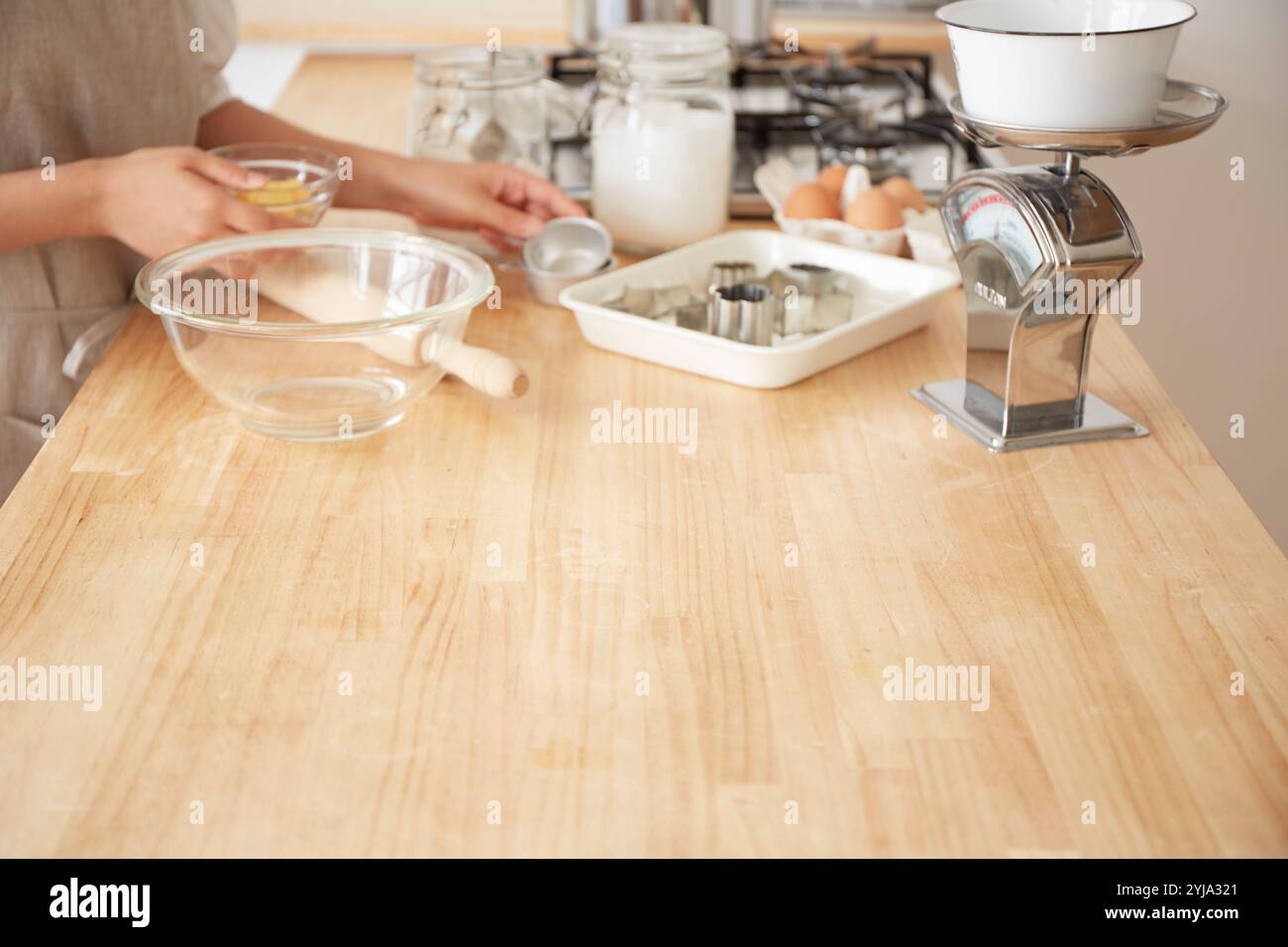 Working at counter hi-res stock photography and images - Alamy