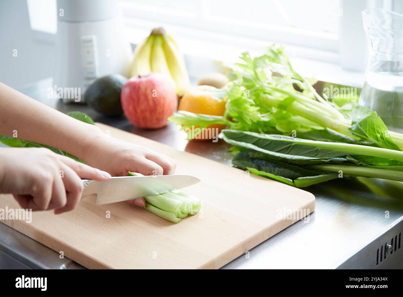 Chopping banana hi-res stock photography and images - Alamy
