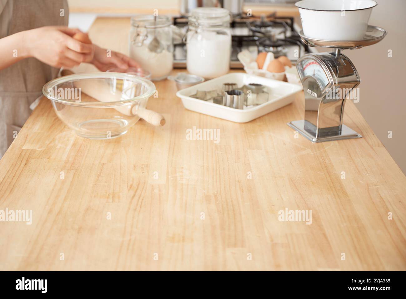 Working at counter hi-res stock photography and images - Alamy