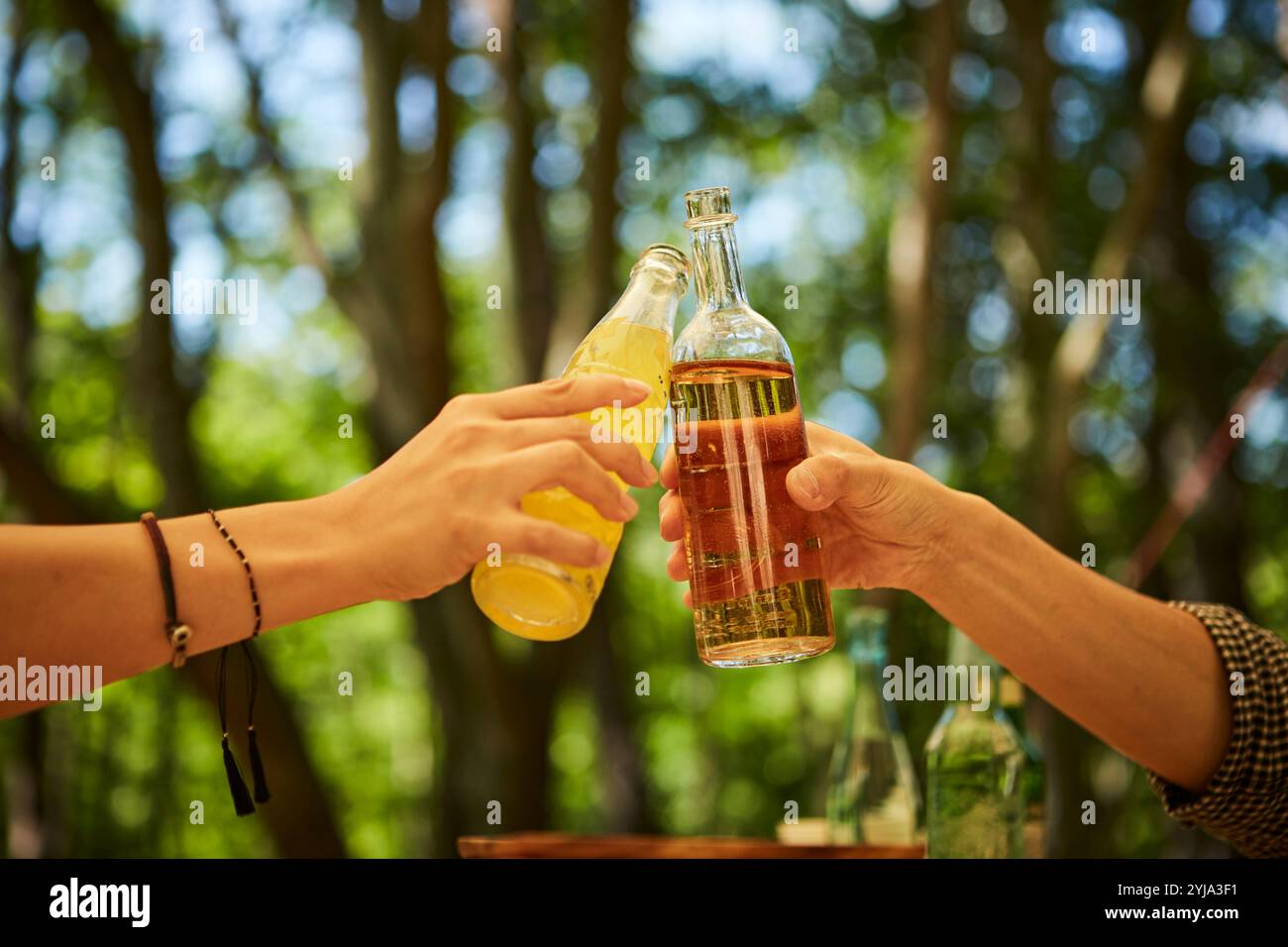 Hands holding travel bottles hi-res stock photography and images - Alamy