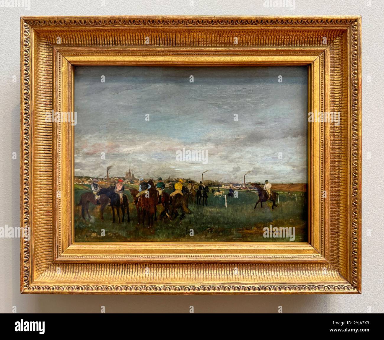 The Races, by Edgar Degas. Jockeys preparing to race horses near ...