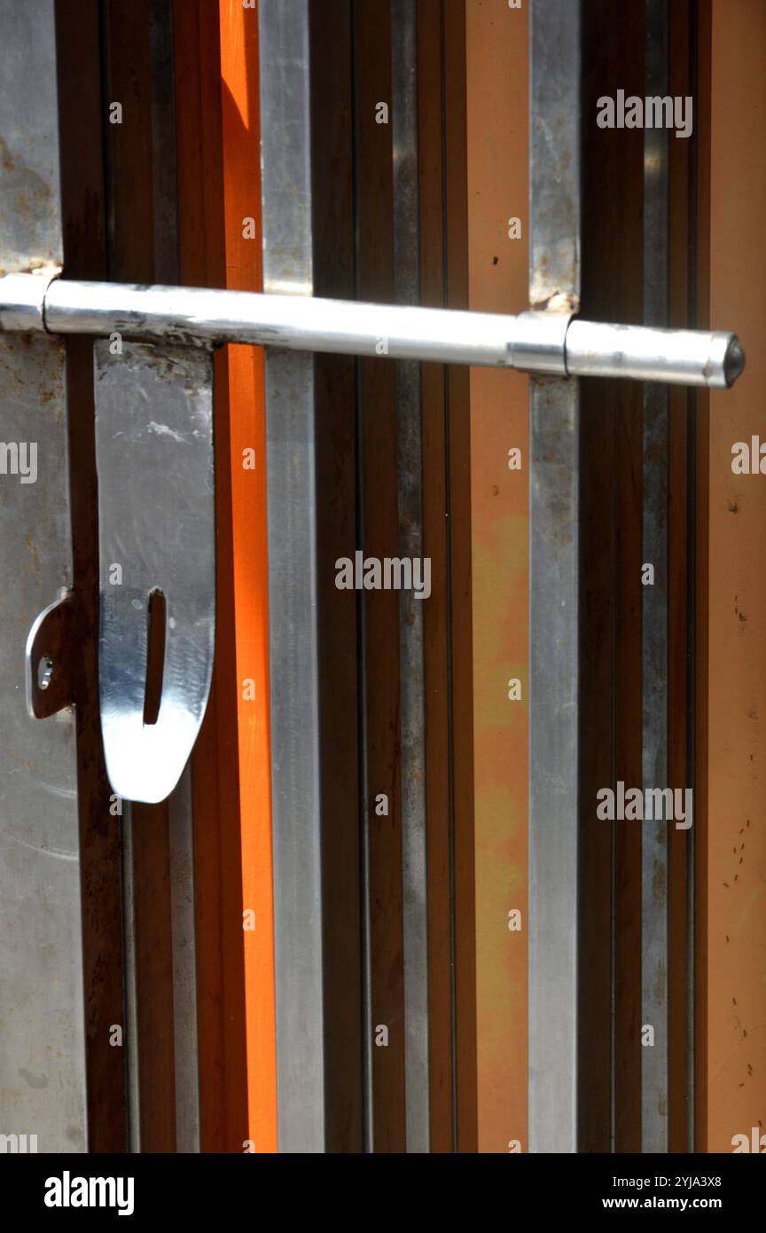 shiny unlocked iron gate Stock Photo - Alamy