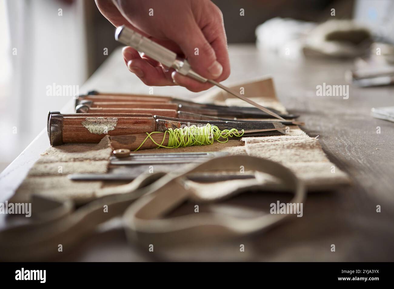 People picking up tools Stock Photo - Alamy