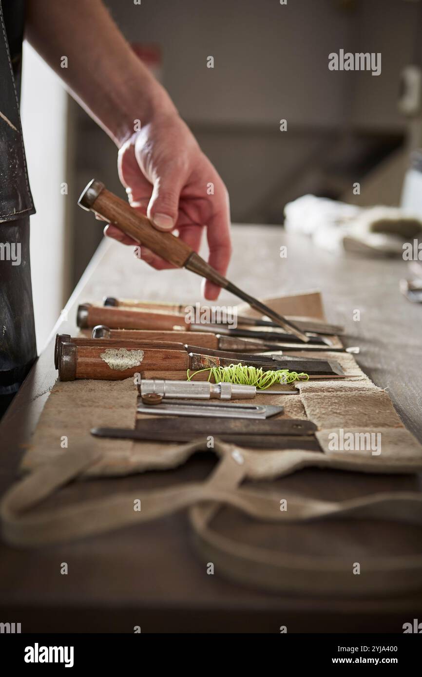 Picking up work tools hi-res stock photography and images - Alamy