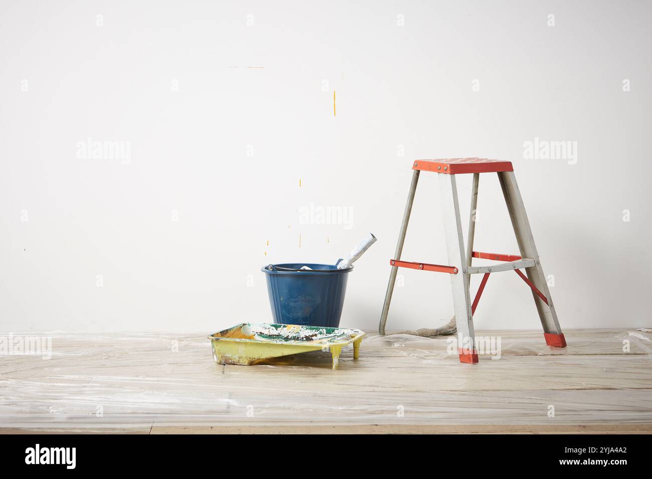 Stepladder and bucket Stock Photo - Alamy