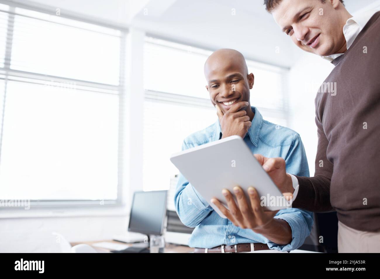 Happy, people and tablet for web development in office, programming report and design feedback ...