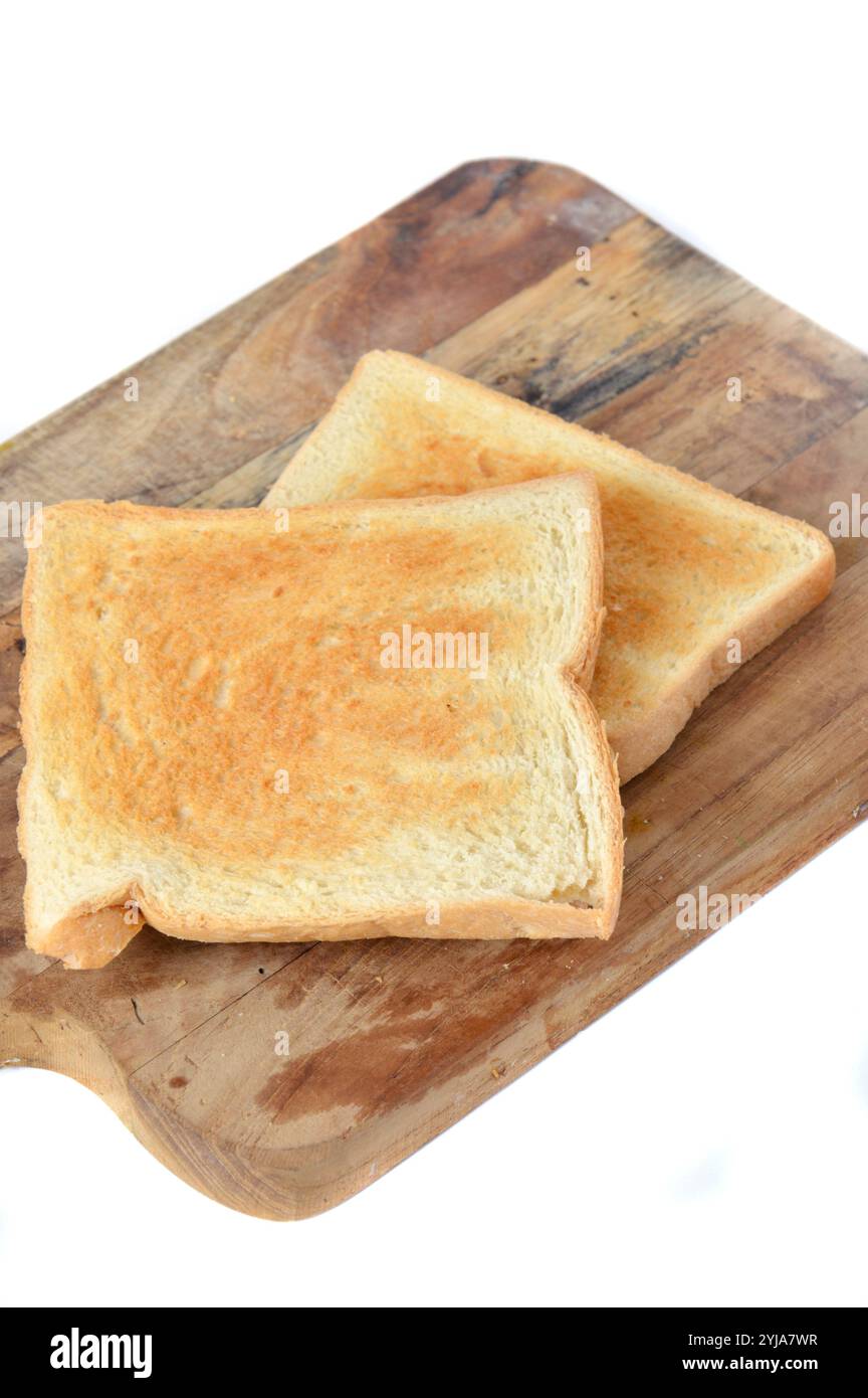 toast on board chopped with white background Stock Photo - Alamy