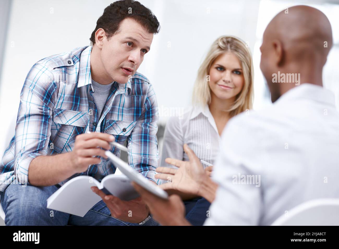 People, talking and brainstorming in office for creativity, project ...
