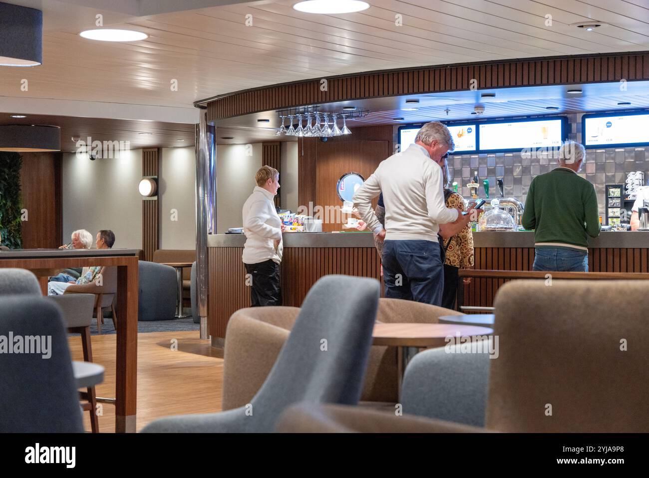 Passengers on board Stena Line Britannica wait to order drinks from the ...