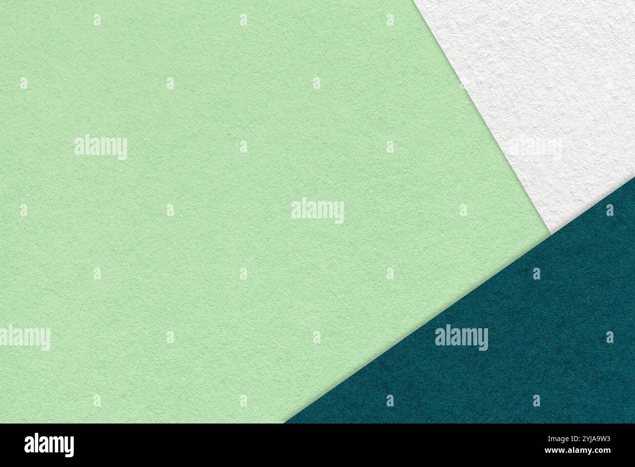 Texture of craft light green color paper background with white and ...
