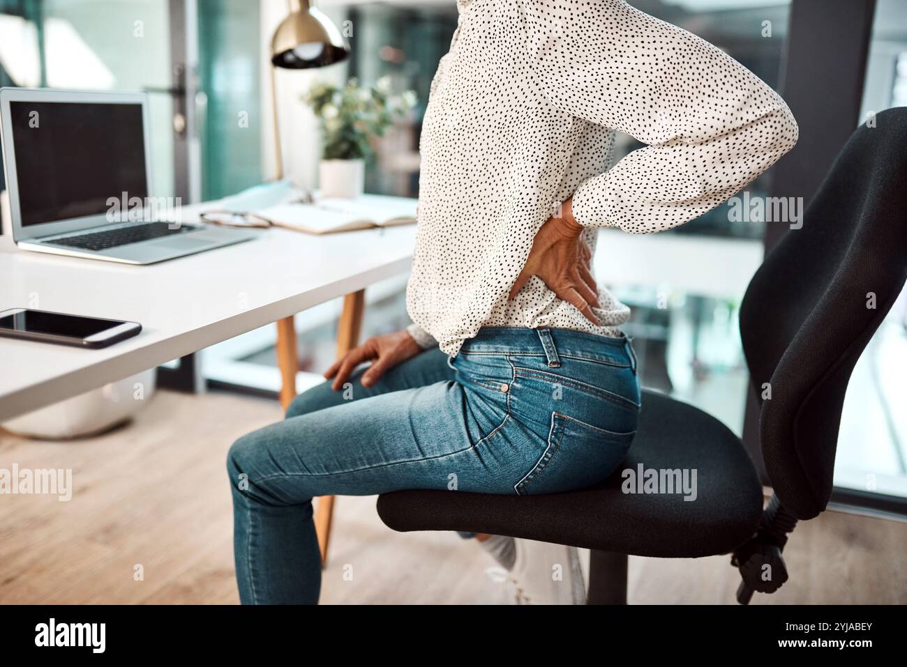 Stress, back pain and business woman in office with tension, muscle ...