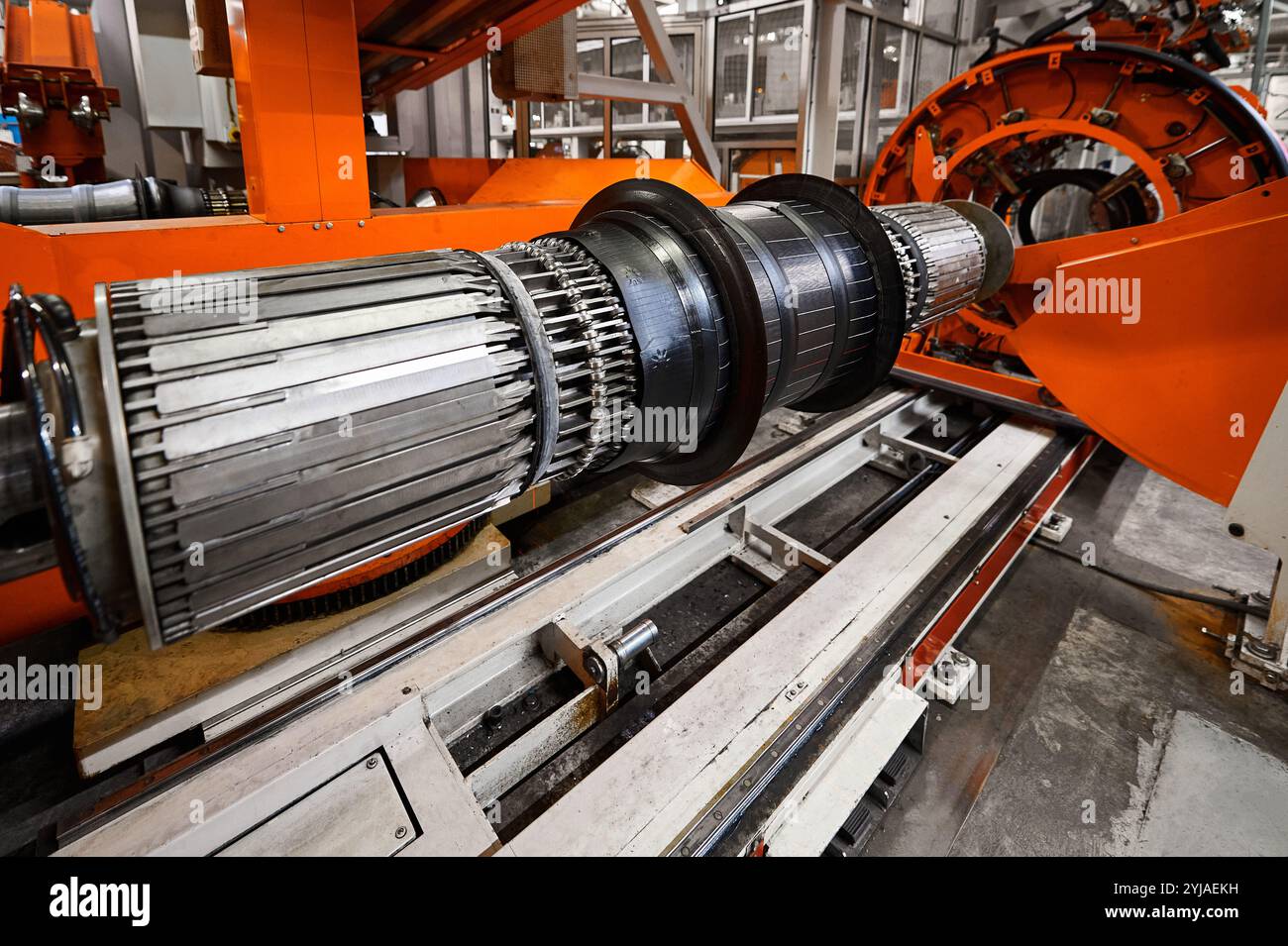 Long shaft with rubber workpieces during tire forming cycle Stock Photo ...