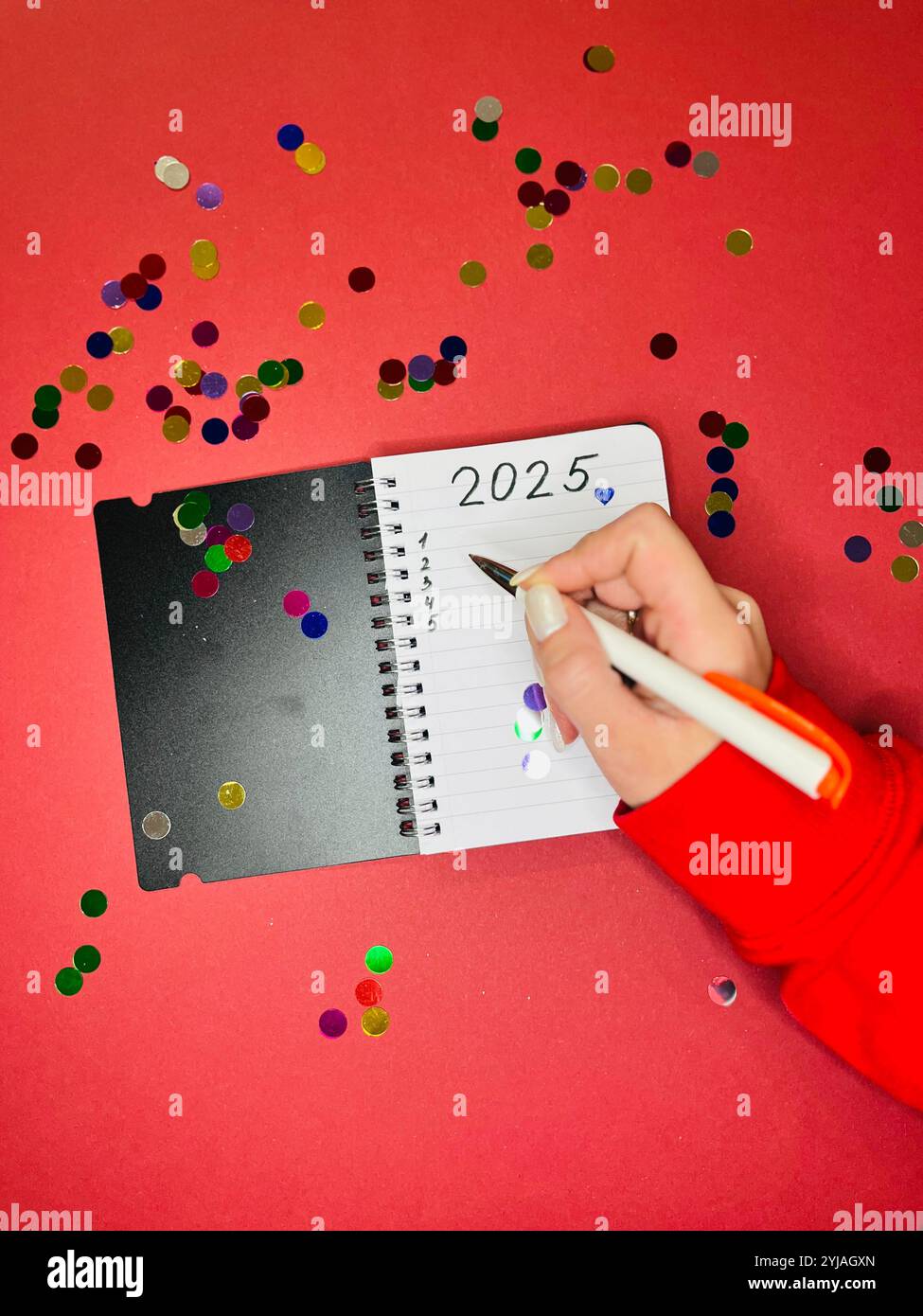 Back to life, goal list concept. Woman's hand writing in empty notebook ...