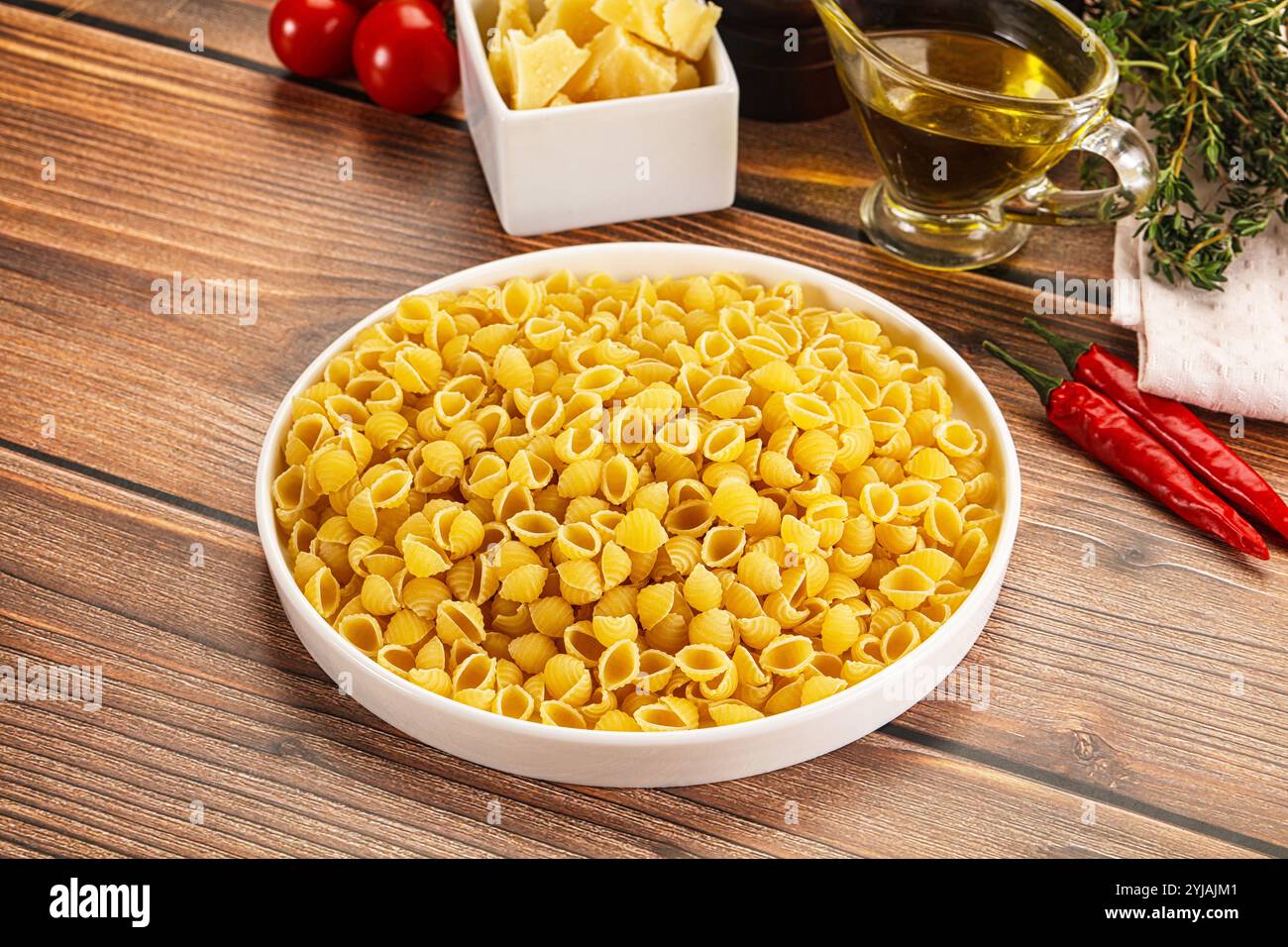 Italian cuisine - dry conchiglie shell pasta Stock Photo - Alamy