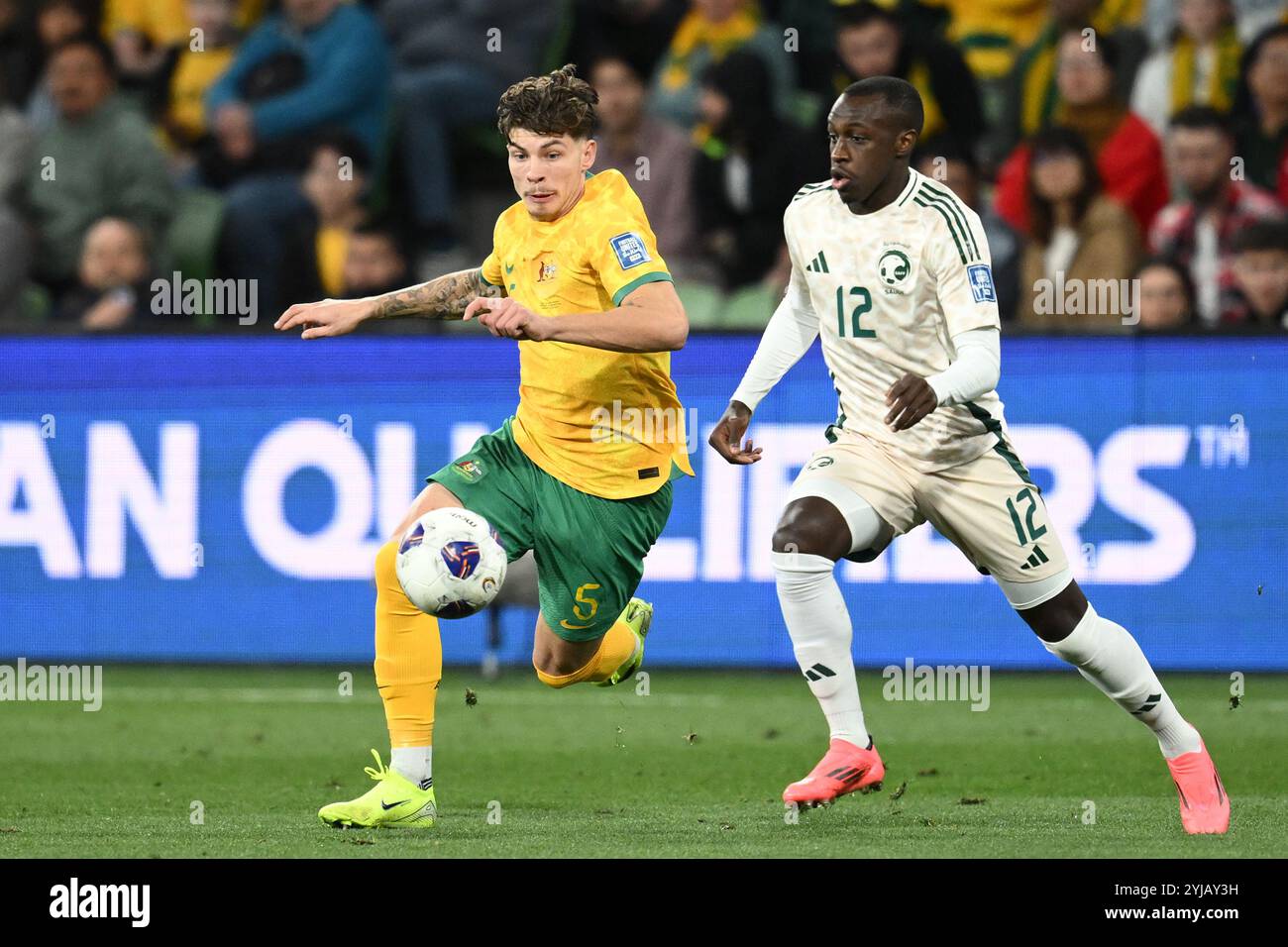 Melbourne, Australia. 14th Nov, 2024. Jordy Bos of the Socceroos (left ...