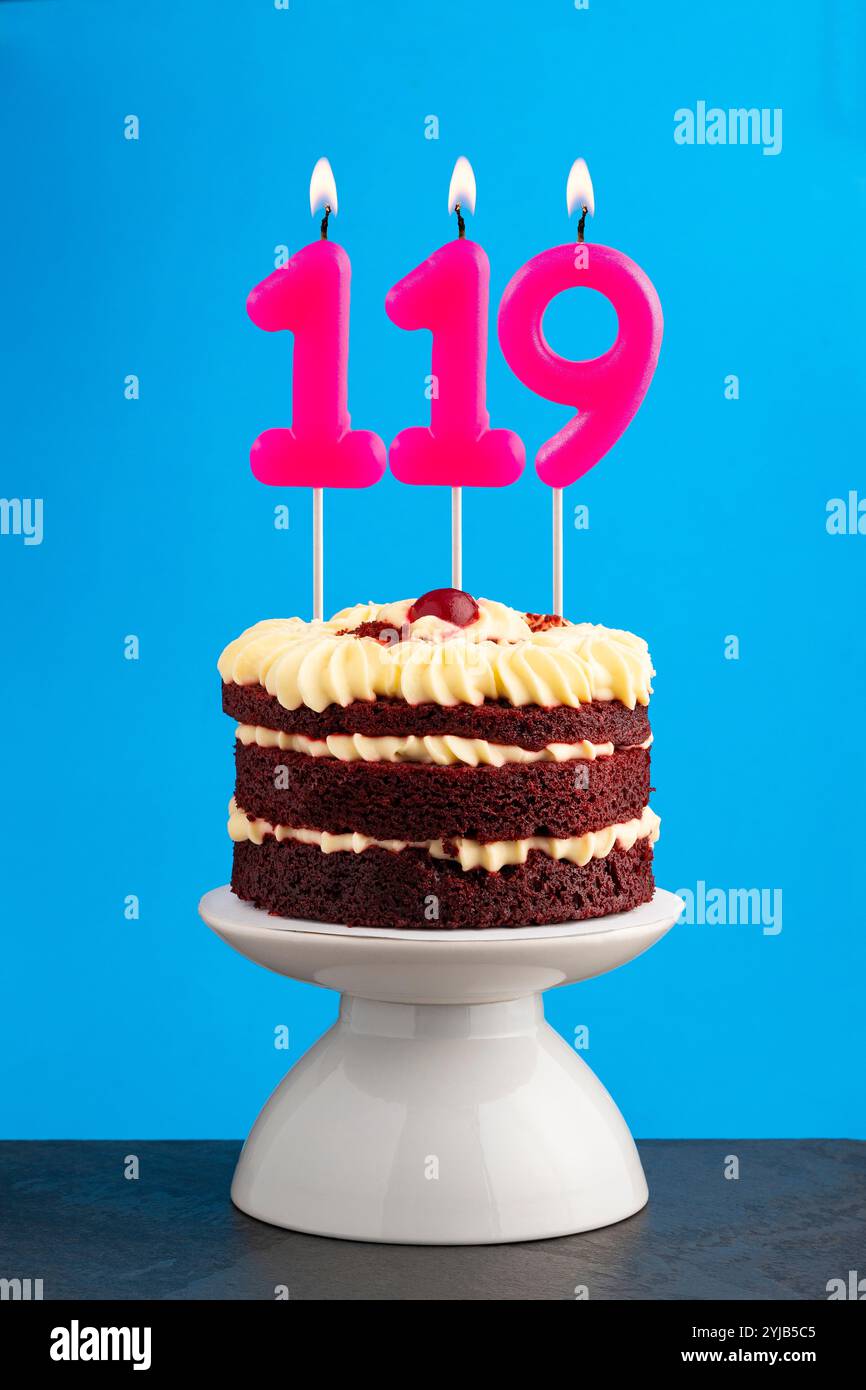 Birthday number 119 - Candle with red velvet cake Stock Photo - Alamy