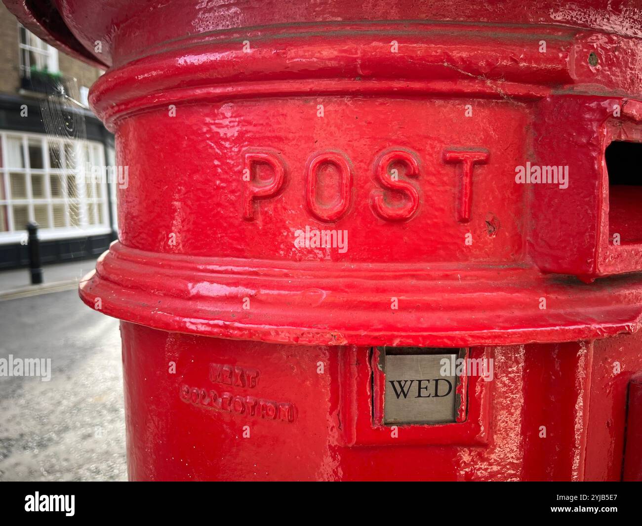 London, UK. 13th Nov, 2024. A red letterbox with the inscription "Post ...
