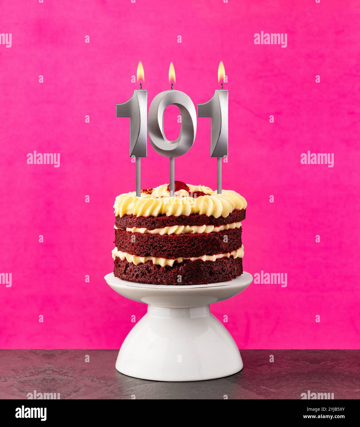 Birthday cake with number 101 candle - Red velvet on a fuchsia ...