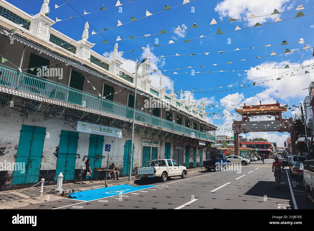 A busy street in Port Louis City, Mauritius, with cars parked on the ...