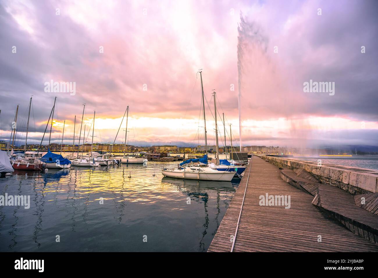 City of Geneva Lac Leman waterfront and Jet d Eau fountain sunset view ...