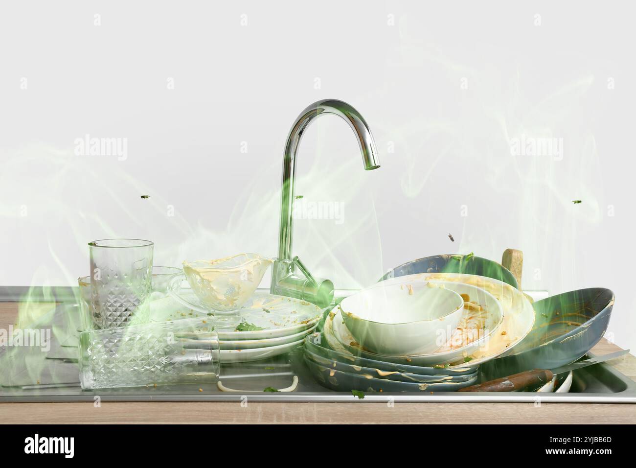 Sink with dirty smelly dishes in kitchen Stock Photo - Alamy