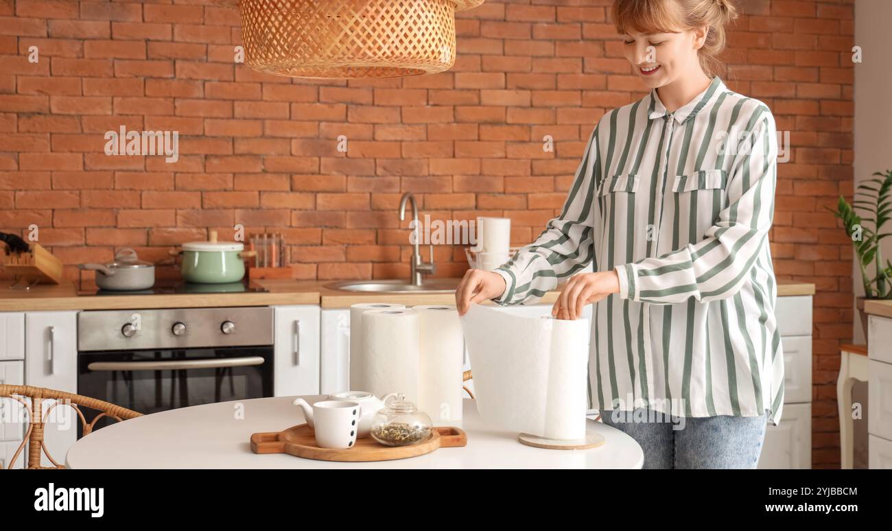 Young woman taking paper hi-res stock photography and images - Alamy