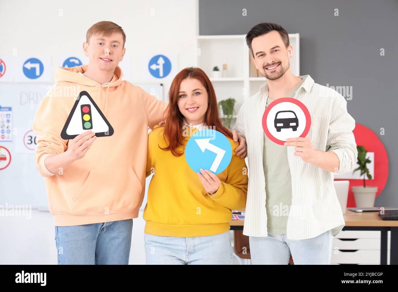Woman driving car road signs hi-res stock photography and images - Alamy