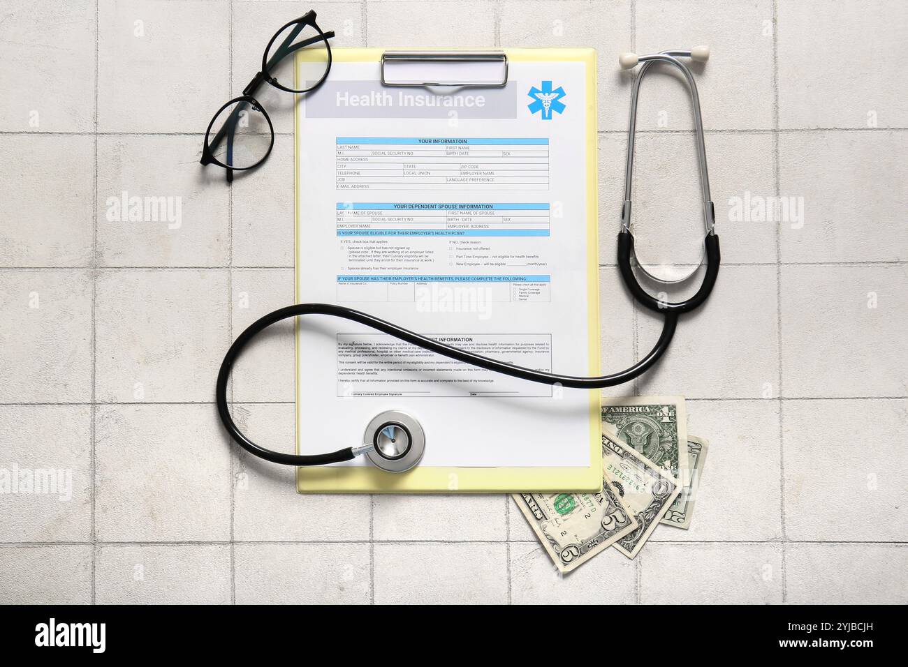 Health insurance form, eyeglasses and stethoscope on light background ...