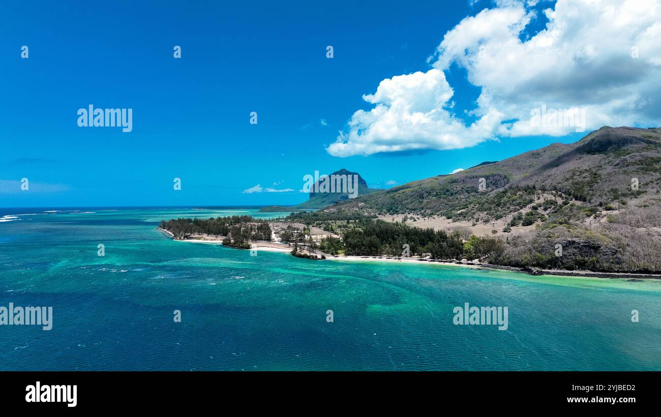 This aerial photograph showcases a tropical beach and lagoon in ...