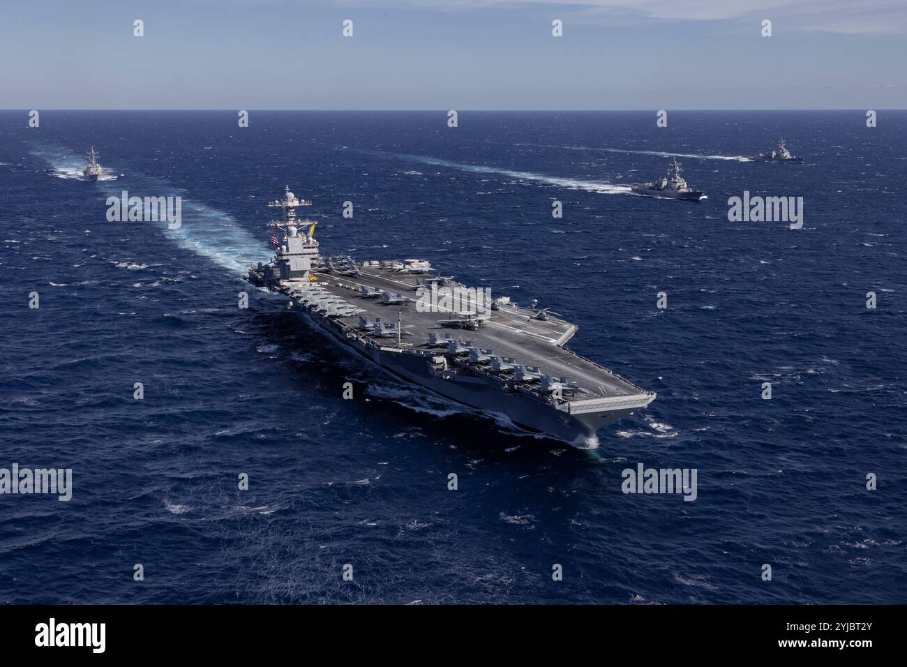 The world's largest aircraft carrier, USS Gerald R. Ford (CVN 78), sails in formation with the ...