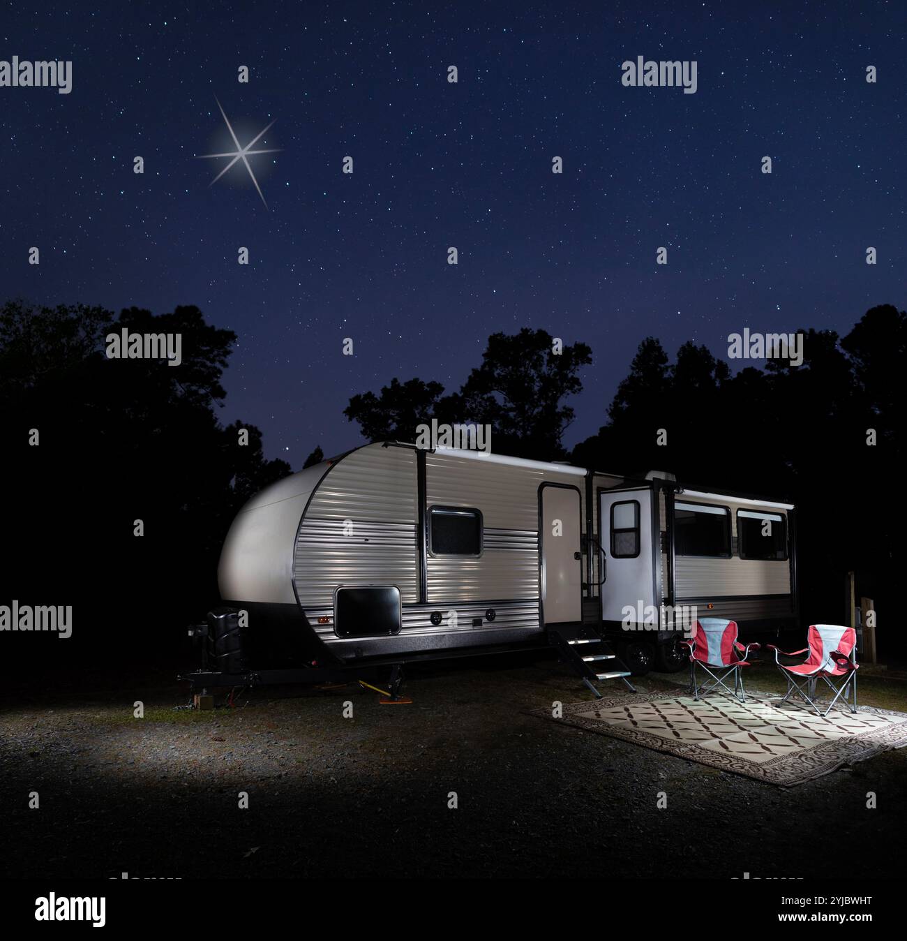 RV campsite with the Christmas Star shining brightly agove on a starry ...