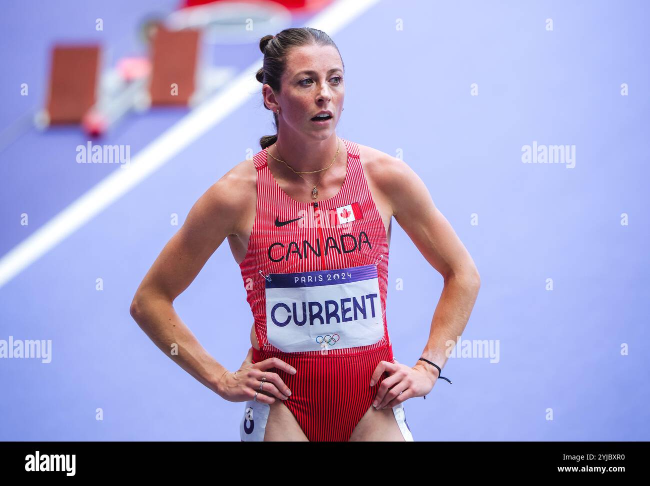 Kate Current participating in the 1500 meters at the Paris 2024 Olympic ...