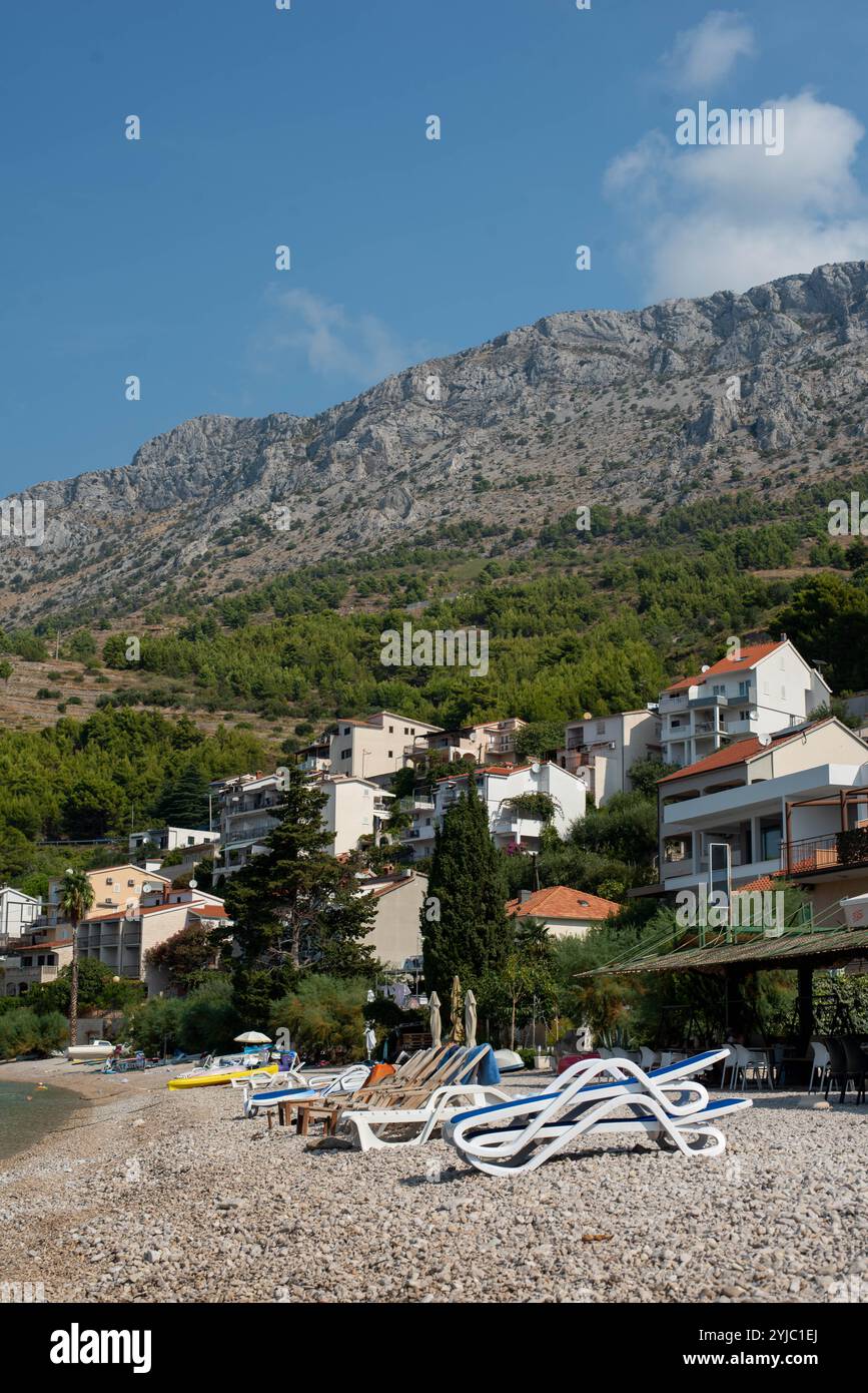 Sunny beaches of Stanići, Croatia, with clear azure waters and sandy ...
