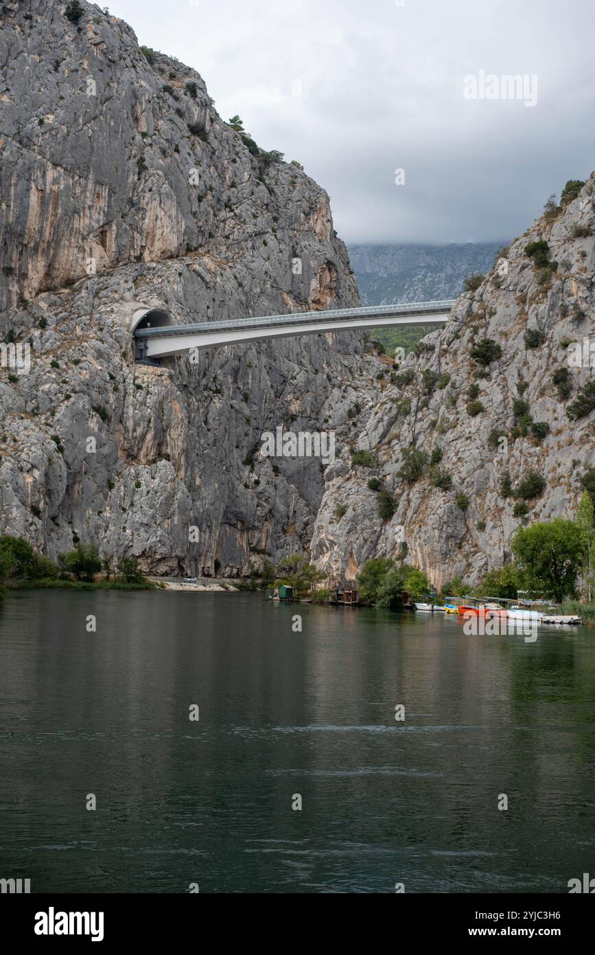 Omis bridge spans the Cetina River in Croatia, featuring scenic tunnels ...