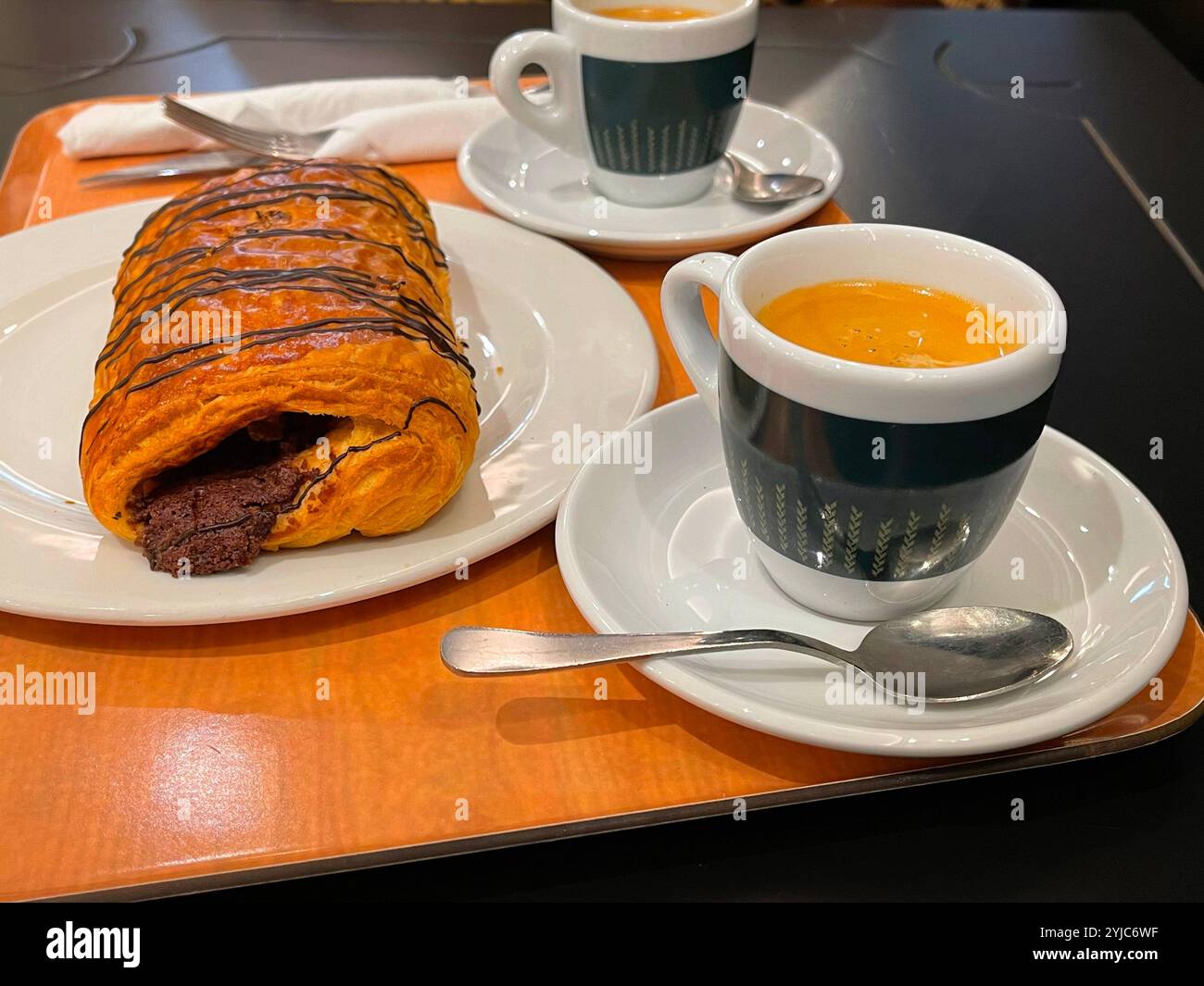 Puff pastry cake with cups of coffee Stock Photo - Alamy