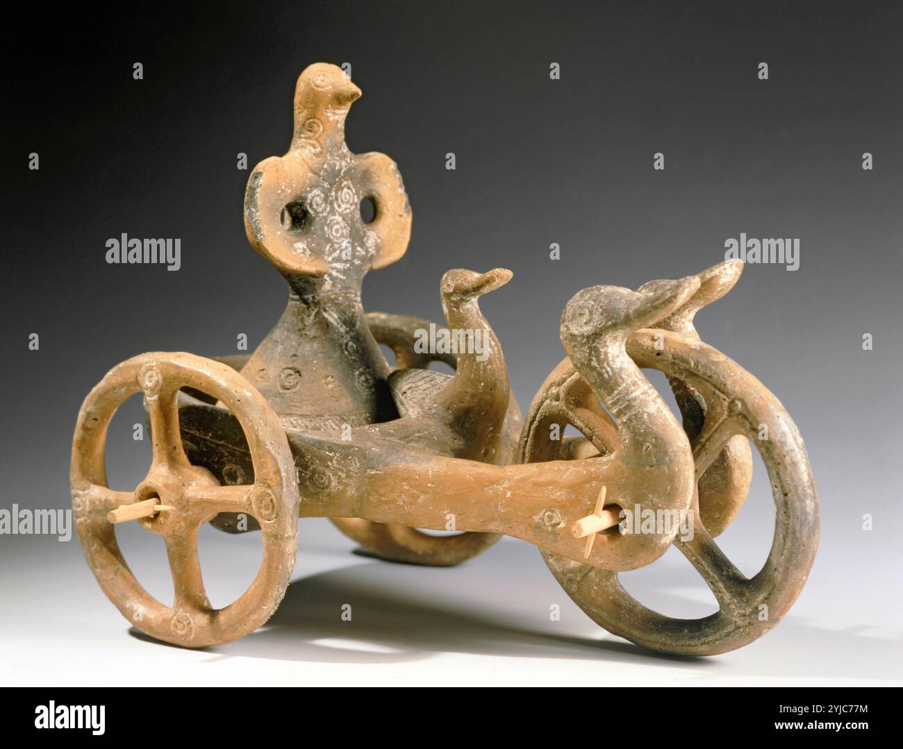 Votive object in shape of chariot with swans and idols, Clay, bronze ...
