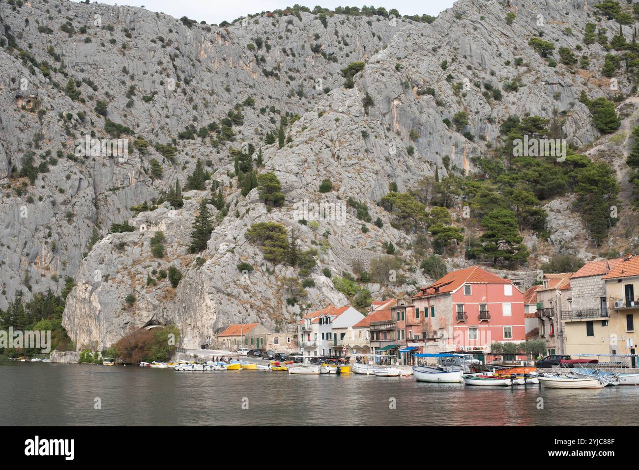View of Omis city from the Cetina River, Croatia, with the scenic river ...