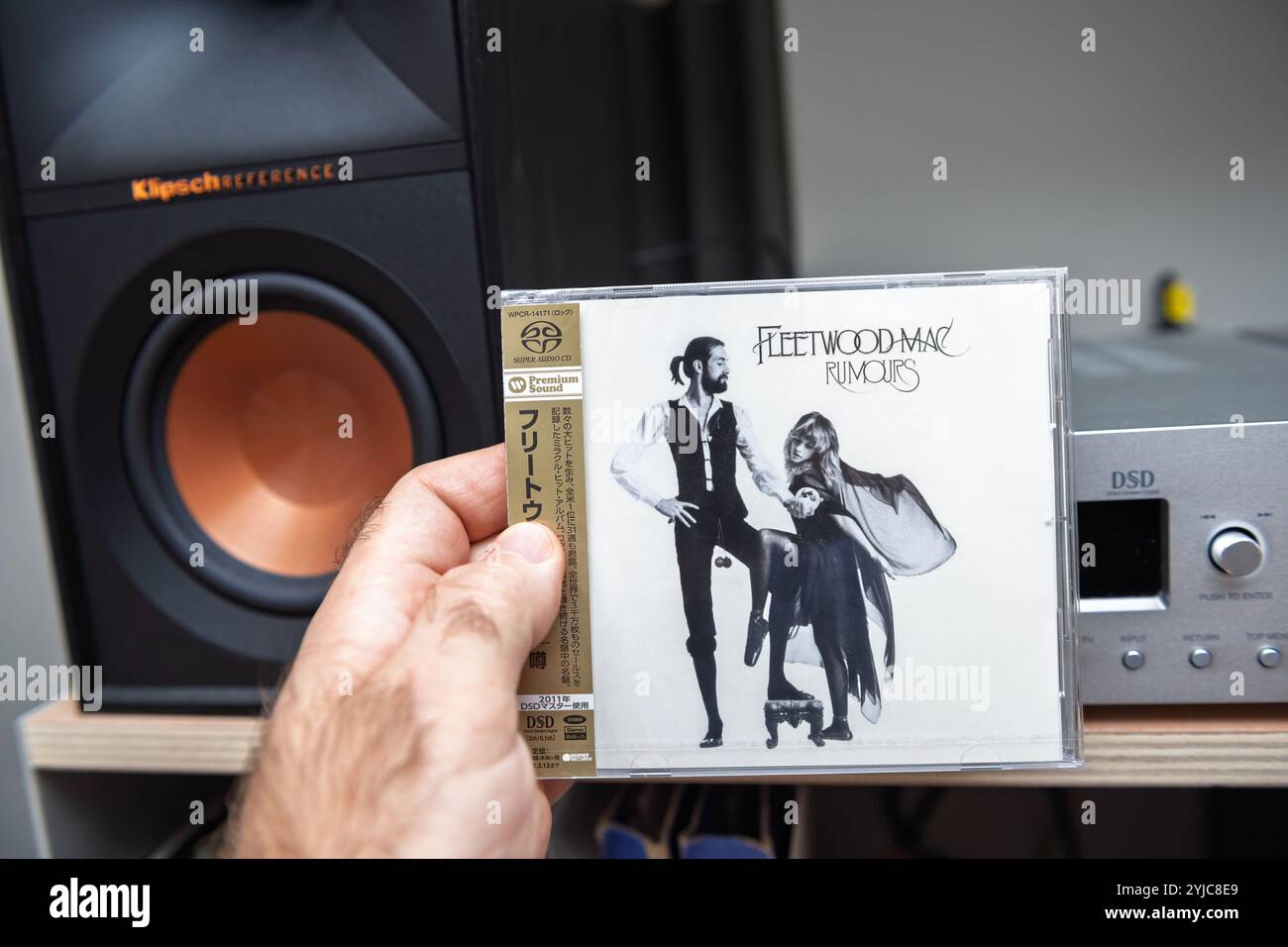 Paris, France - Oct 31, 2024: Hand holding Fleetwood Mac Rumours SACD ...