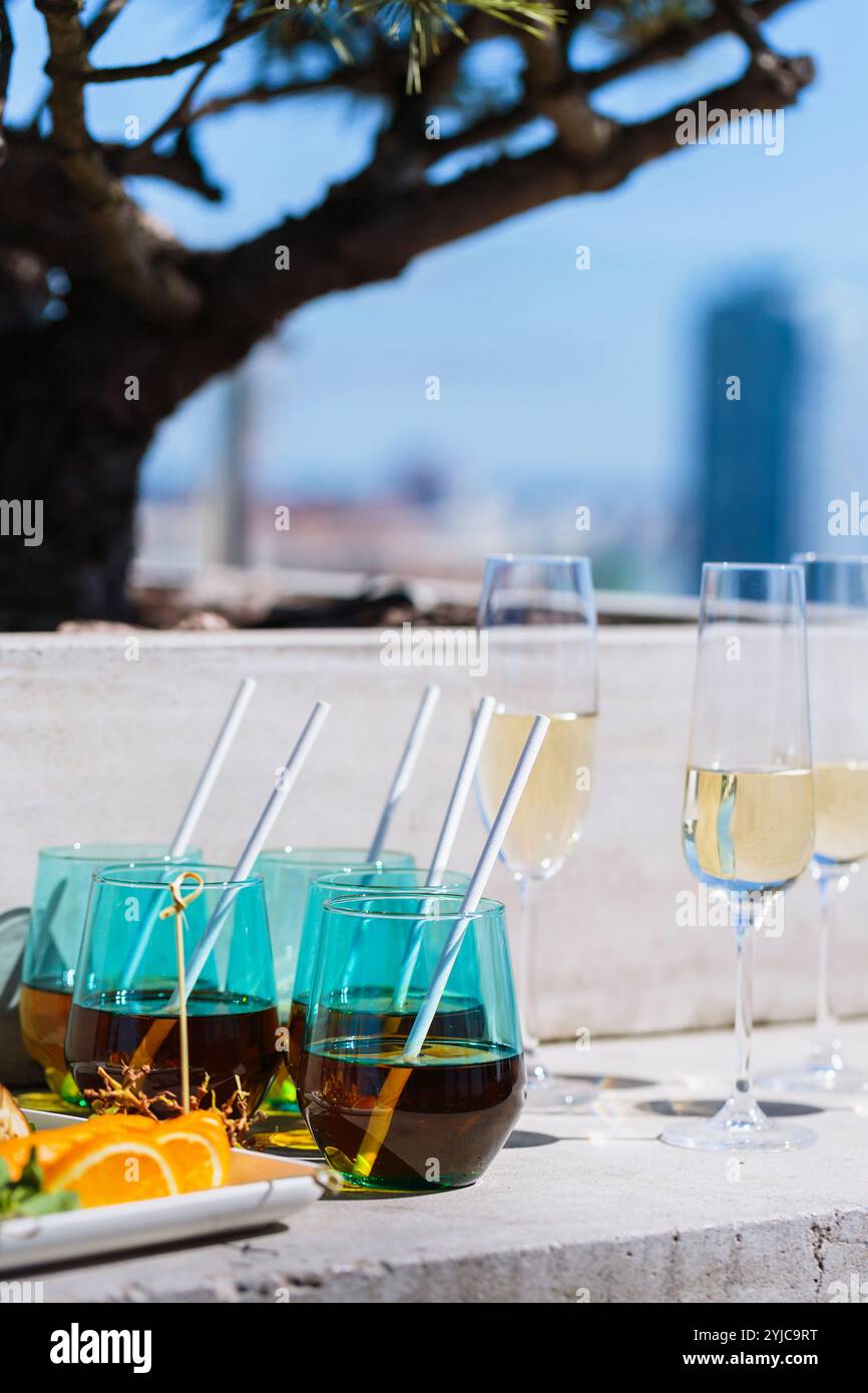 Refreshing Outdoor Drink Setup with Champagne and Fruit Stock Photo - Alamy