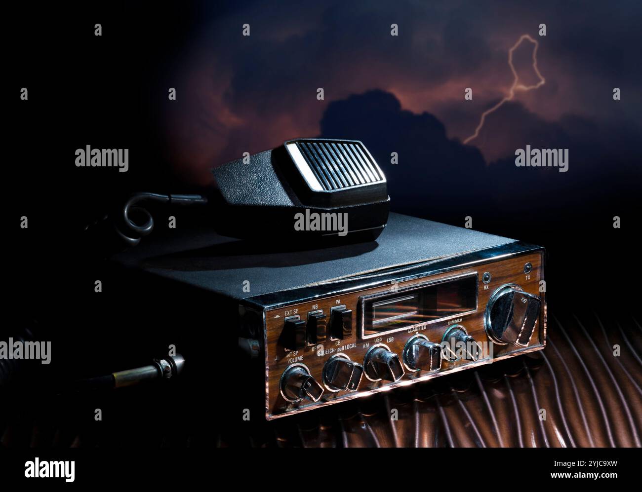 Lightning storm behind a CB radio and microphone Stock Photo - Alamy