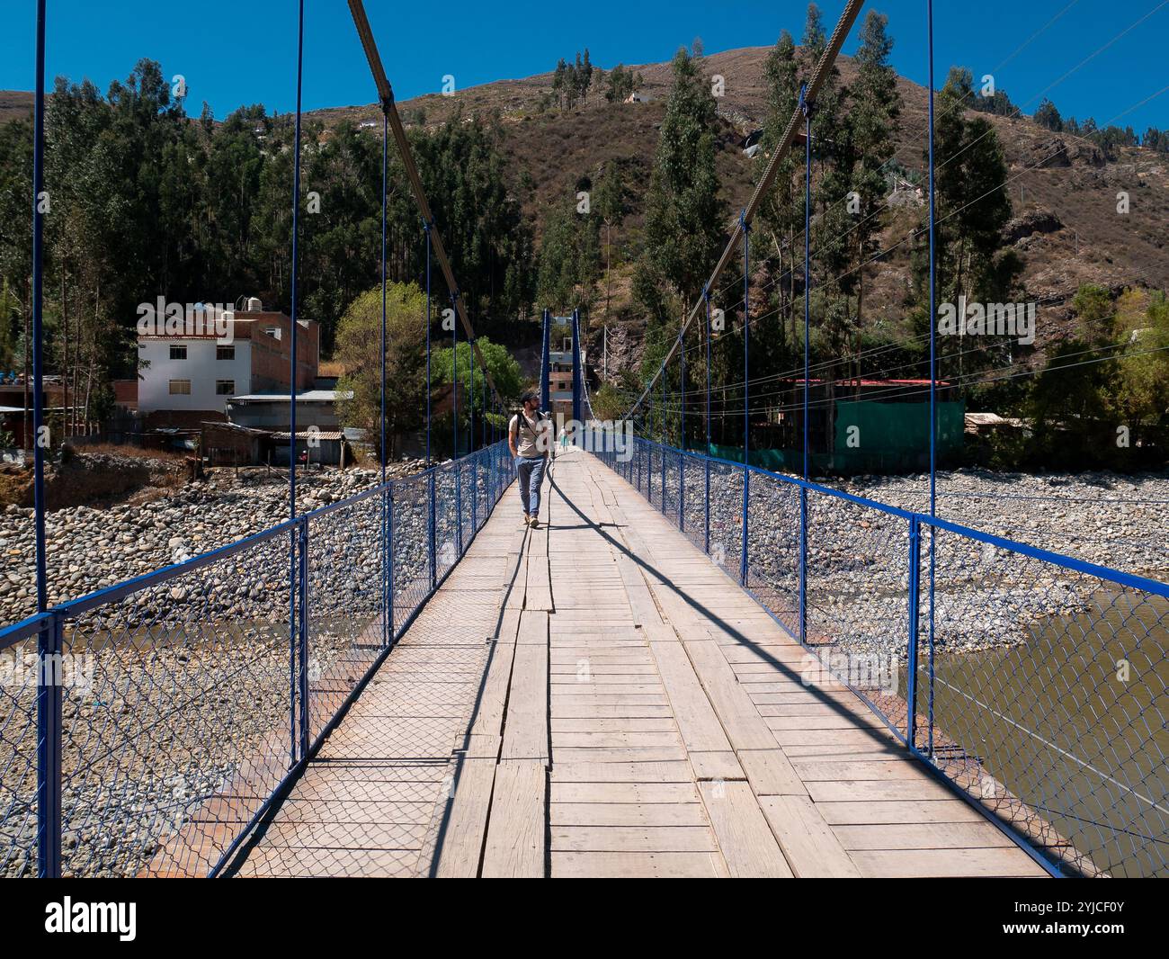 Huaraz, Ancash, Peru - July 22 2024: A White Man Walks Across a ...