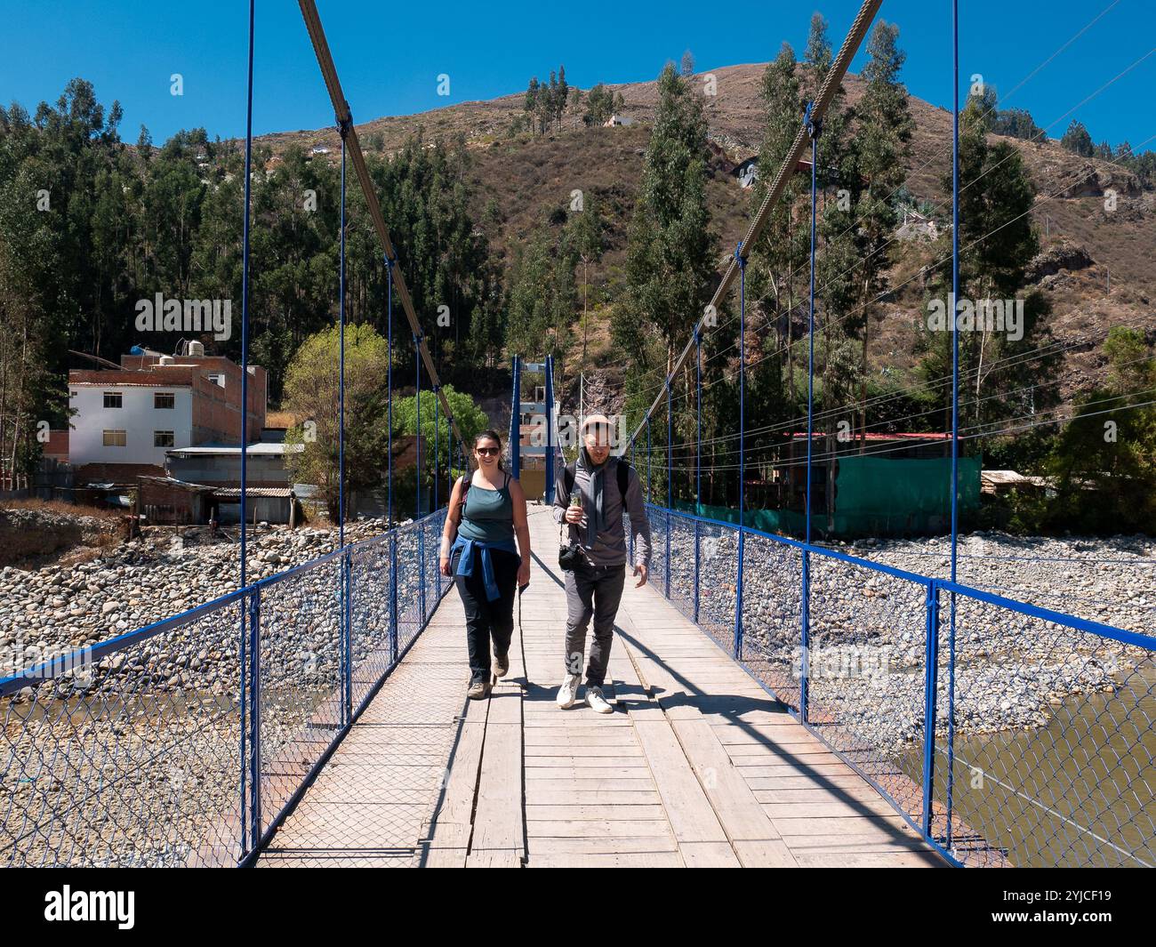 Huaraz, Ancash, Peru - July 22 2024: Tourists Walk Across a Suspension ...